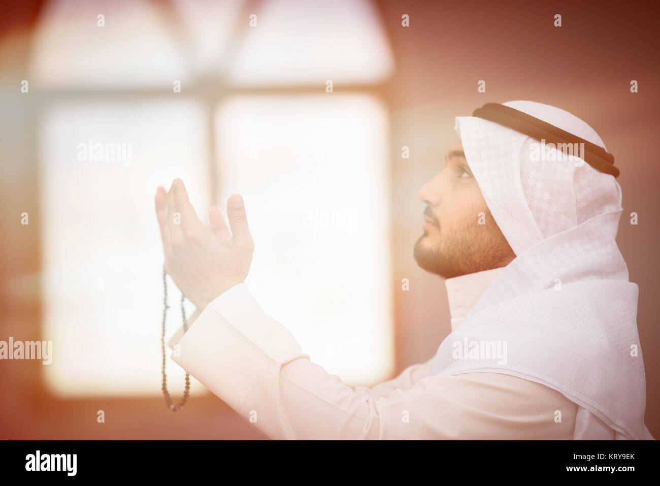 Religious muslim man praying inside the mosque Stock Photo - Alamy