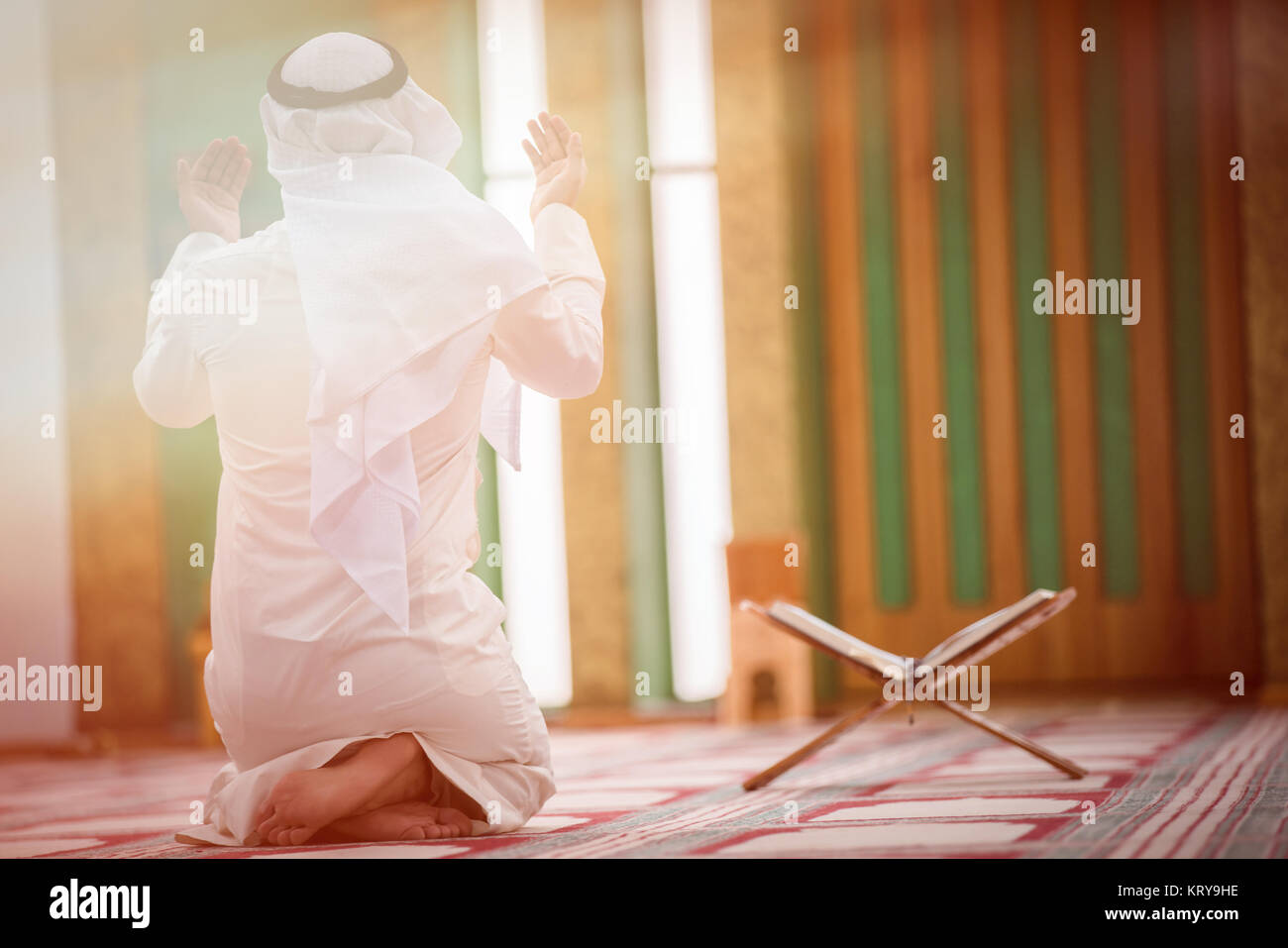 Religious muslim man praying inside the mosque Stock Photo - Alamy