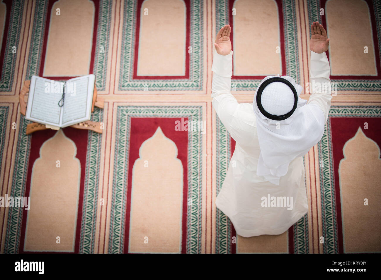 Religious muslim man praying inside the mosque Stock Photo - Alamy