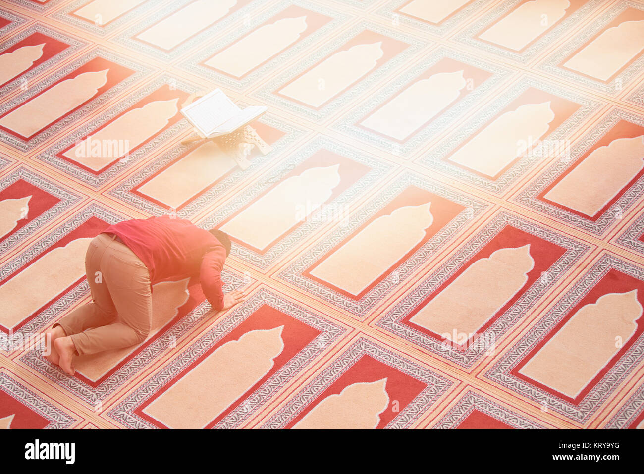 Religious muslim man praying inside the mosque Stock Photo - Alamy