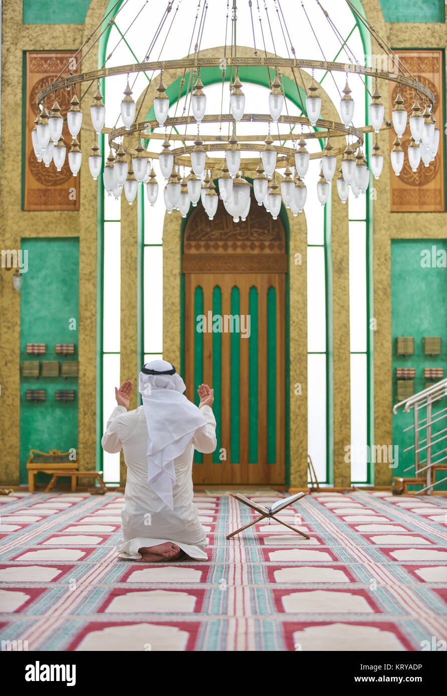 Religious muslim man praying inside the mosque Stock Photo - Alamy