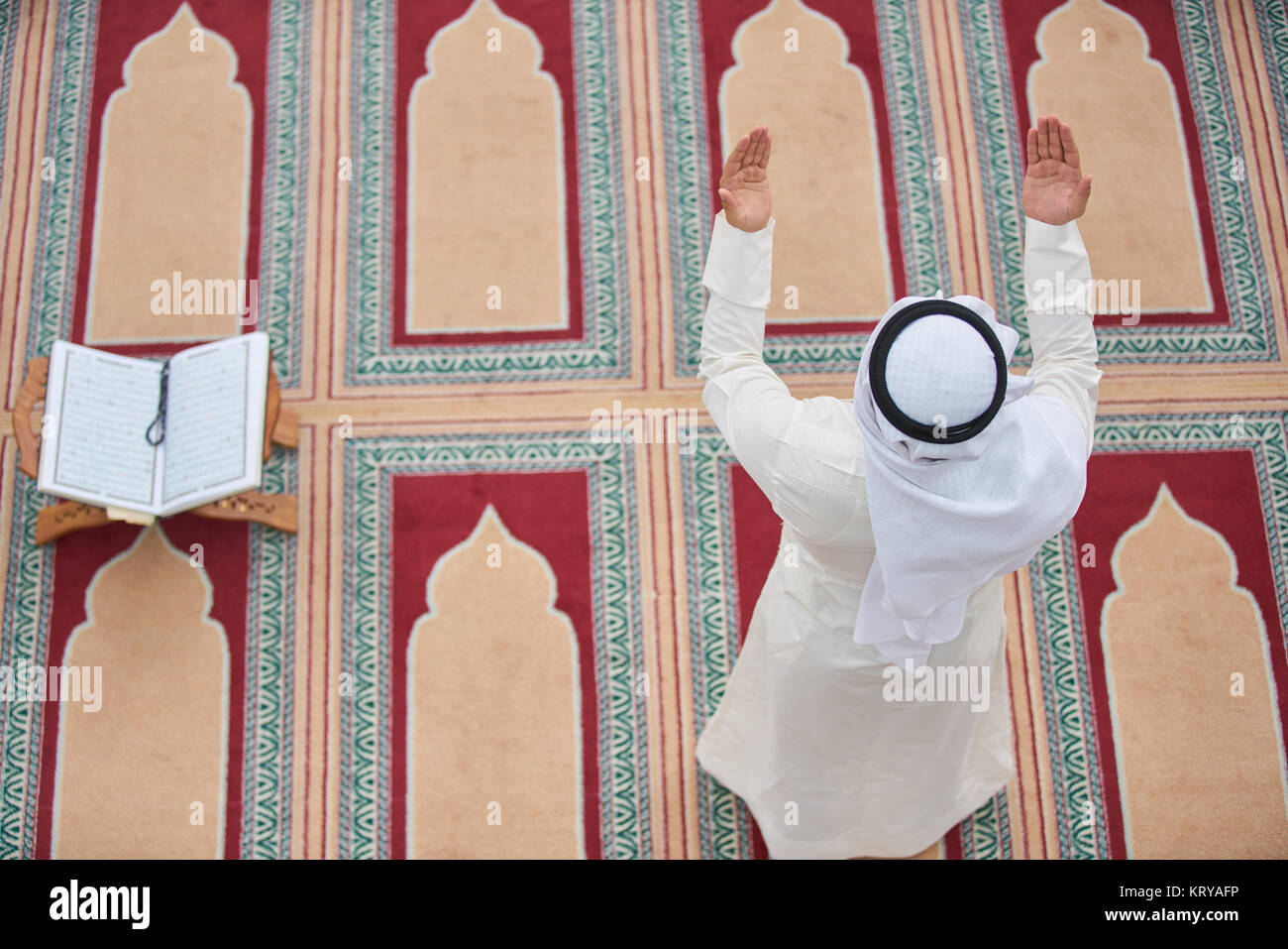 Religious muslim man praying inside the mosque Stock Photo - Alamy