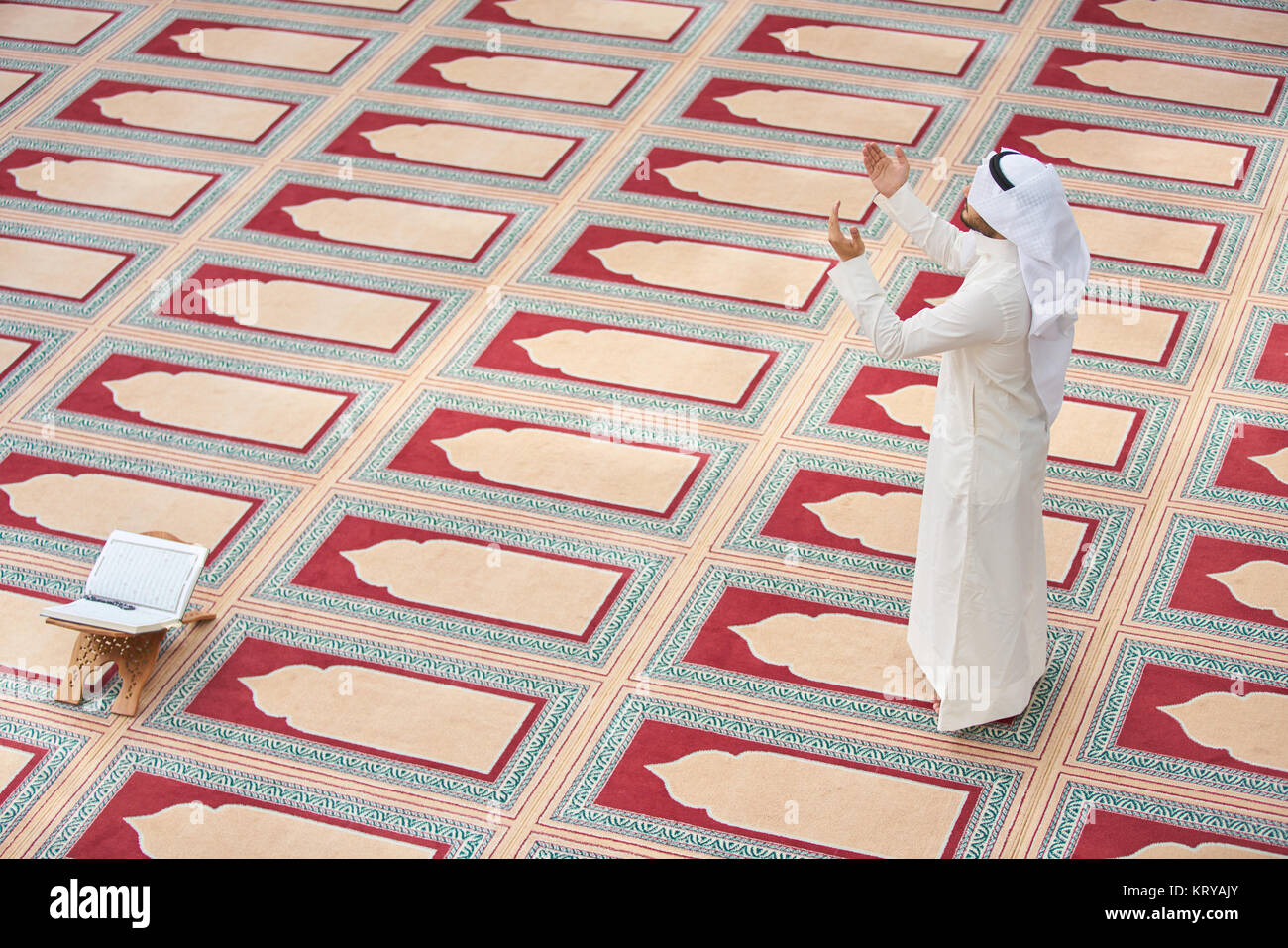 Religious muslim man praying inside the mosque Stock Photo - Alamy