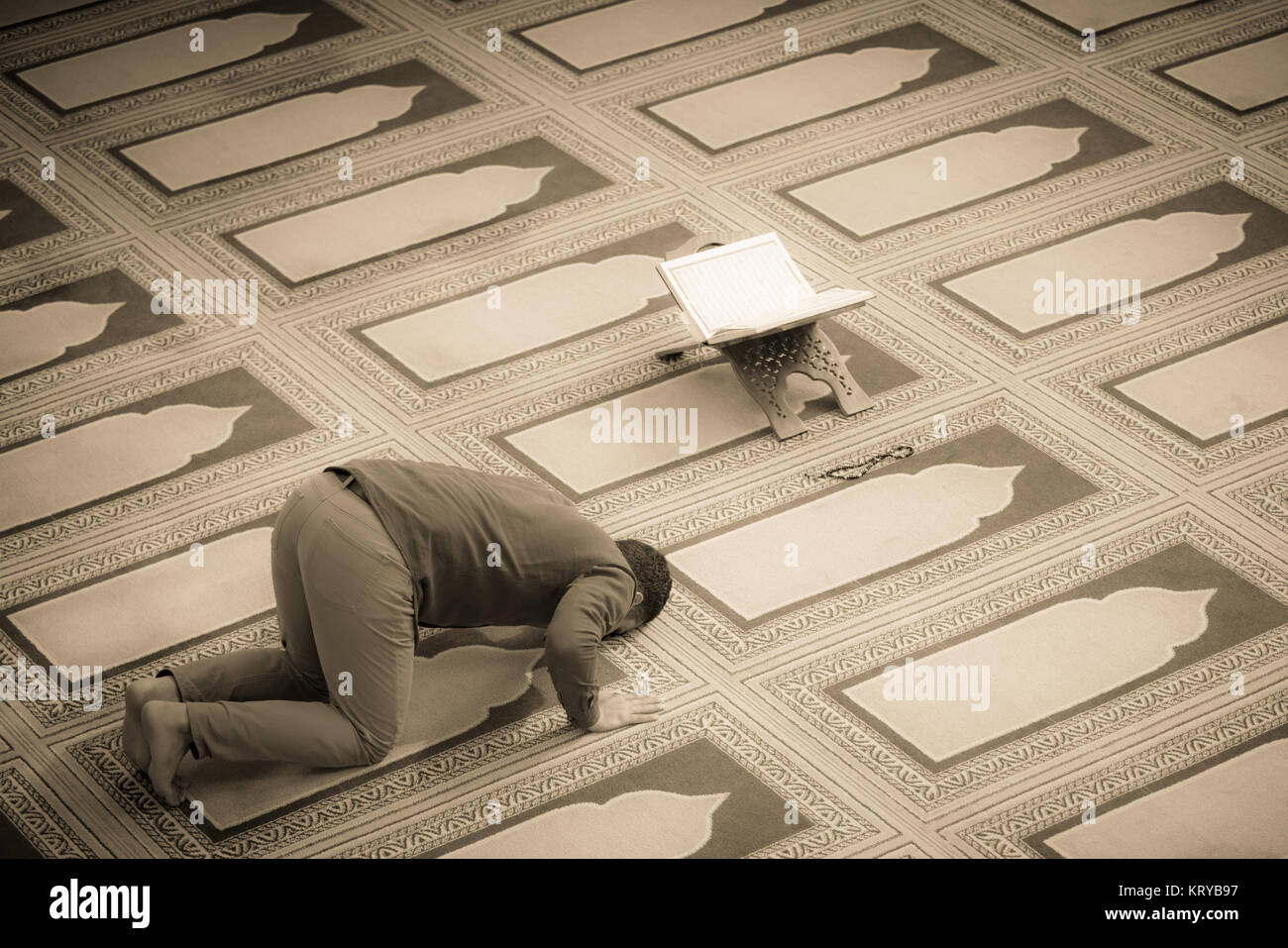 Religious muslim man praying inside the mosque Stock Photo - Alamy
