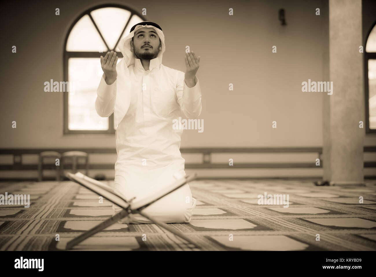 Religious muslim man praying inside the mosque Stock Photo - Alamy