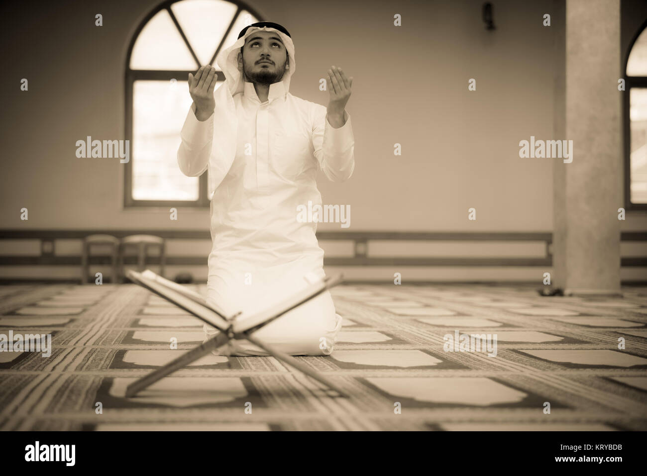 Religious muslim man praying inside the mosque Stock Photo - Alamy