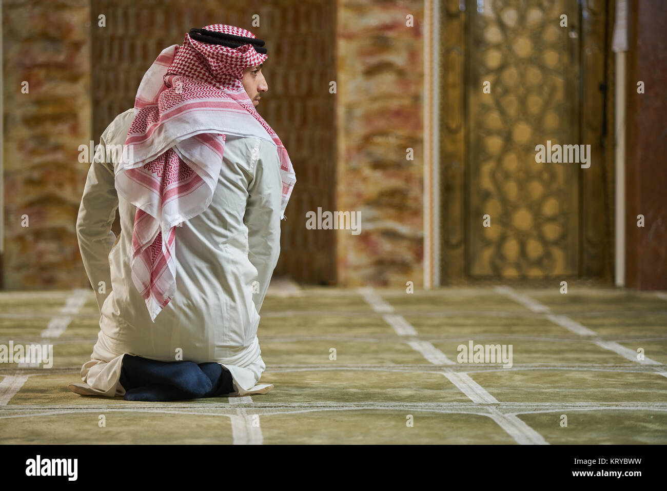 Religious muslim man praying inside the mosque Stock Photo - Alamy