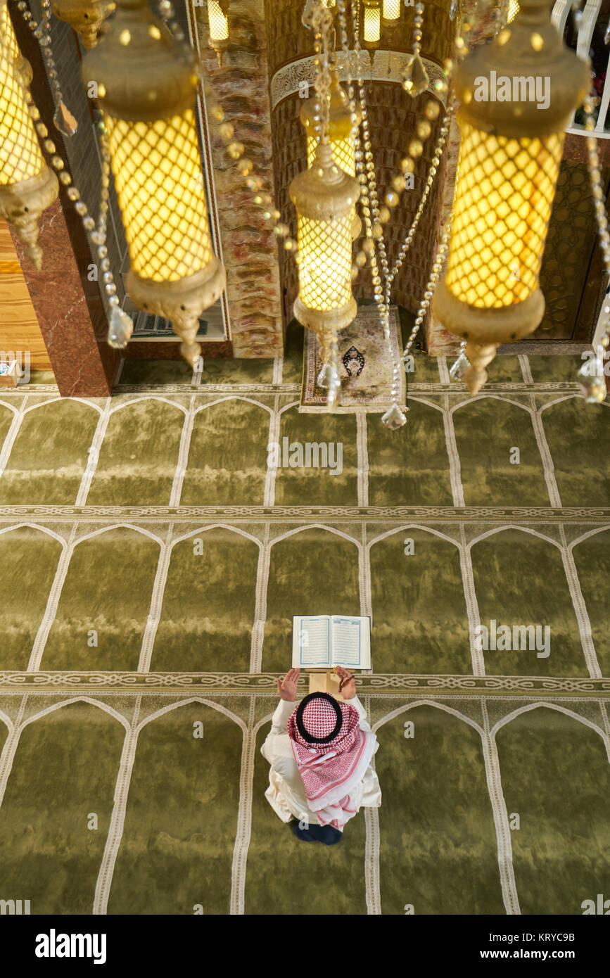 Religious muslim man praying inside the mosque Stock Photo - Alamy