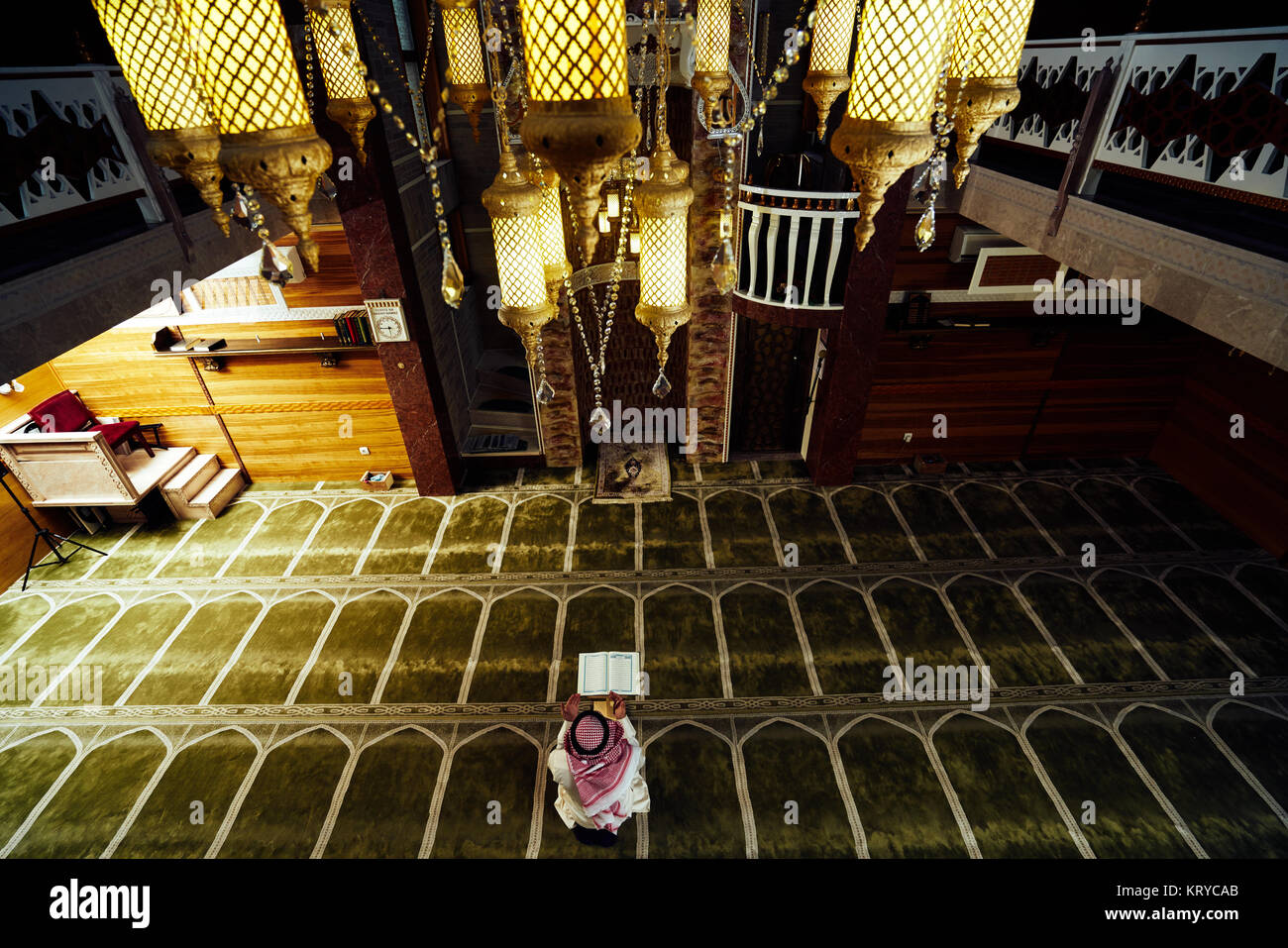 Religious muslim man praying inside the mosque Stock Photo - Alamy
