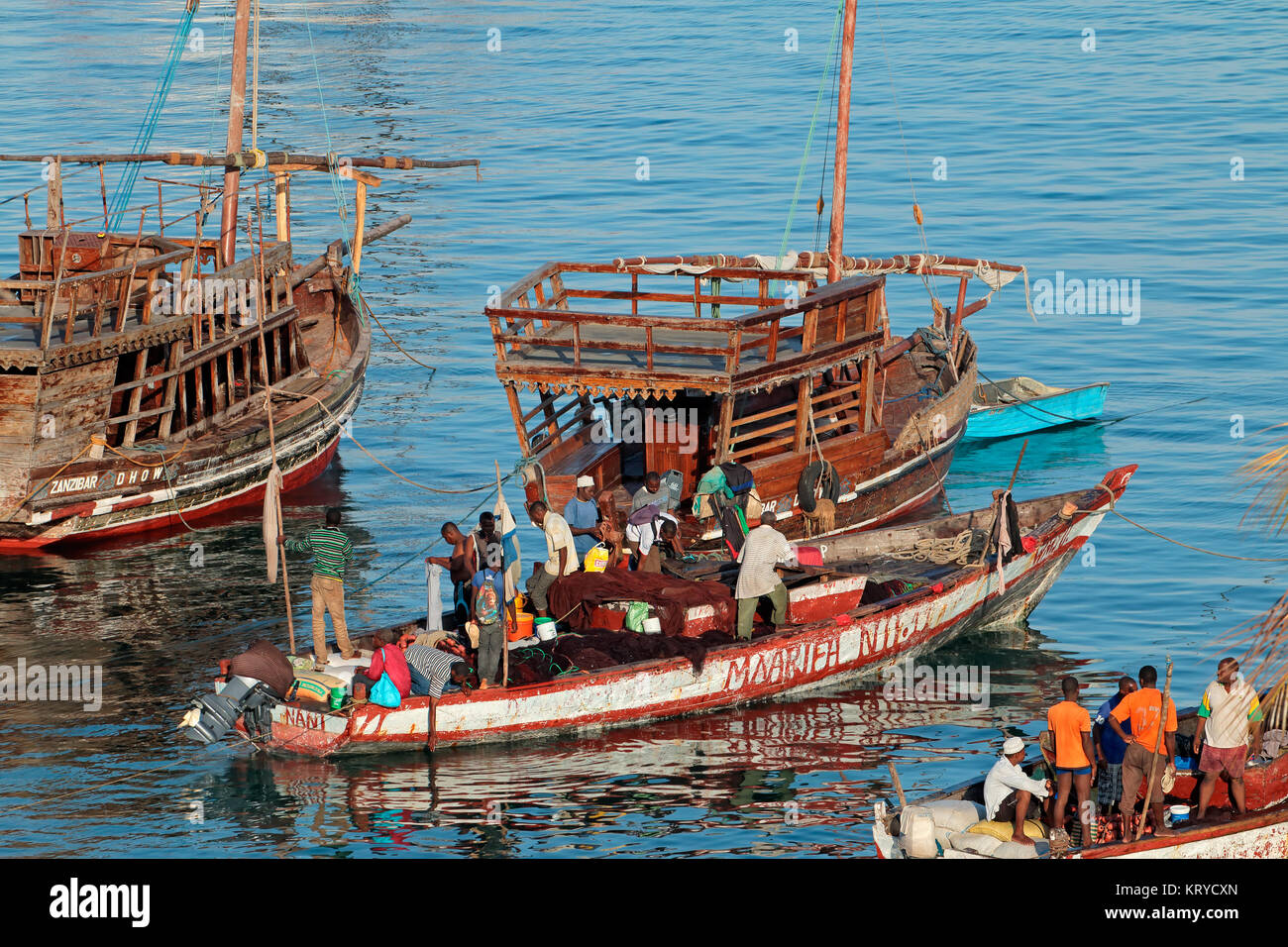 STONE TOWN, ZANZIBAR, TANZANIA - OCTOBER 31, 2014: Fishermen working on ...