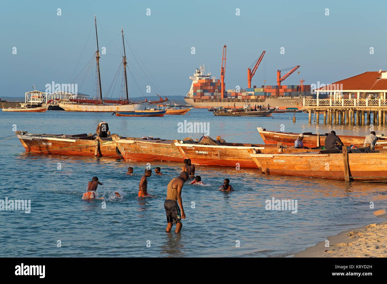STONE TOWN, ZANZIBAR, TANZANIA - OCTOBER 29, 2014: Boats anchored and ...
