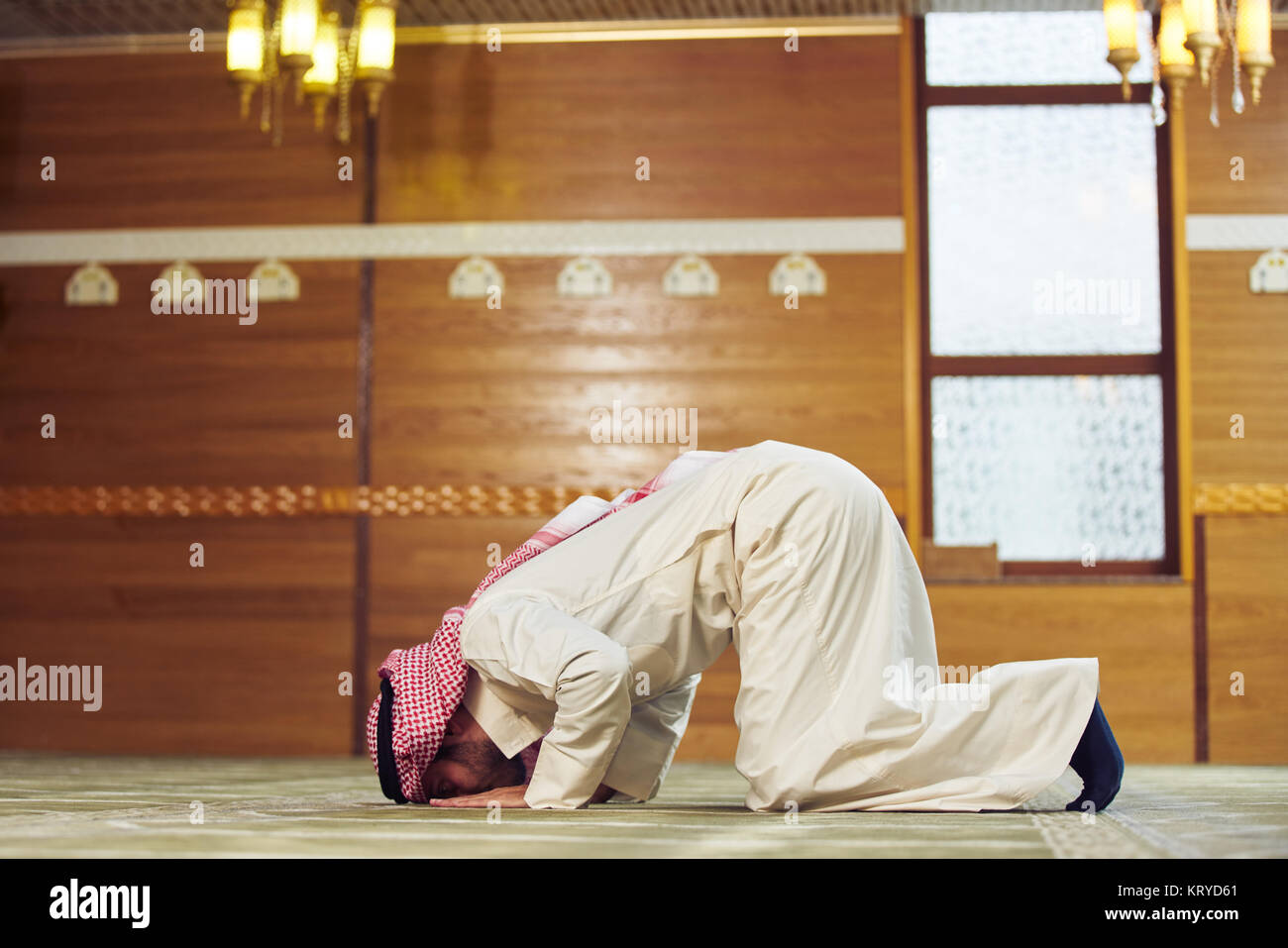 Religious muslim man praying inside the mosque Stock Photo - Alamy
