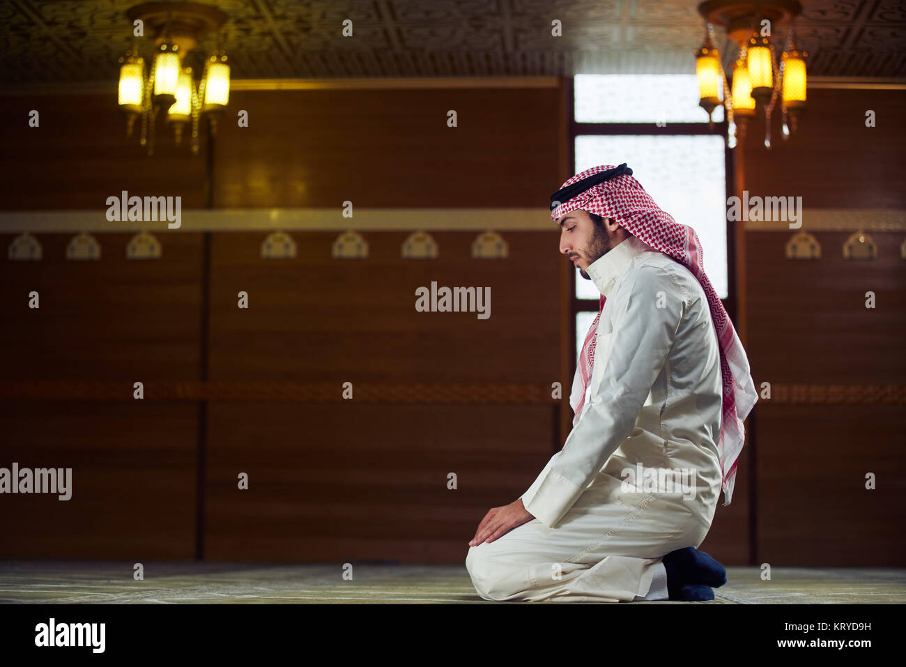 Religious muslim man praying inside the mosque Stock Photo - Alamy