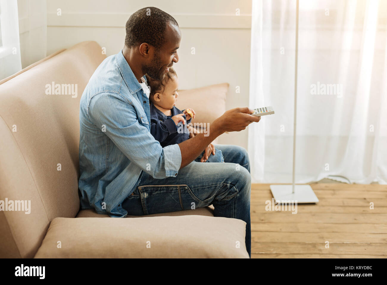 Caring father entertaining his son Stock Photo - Alamy