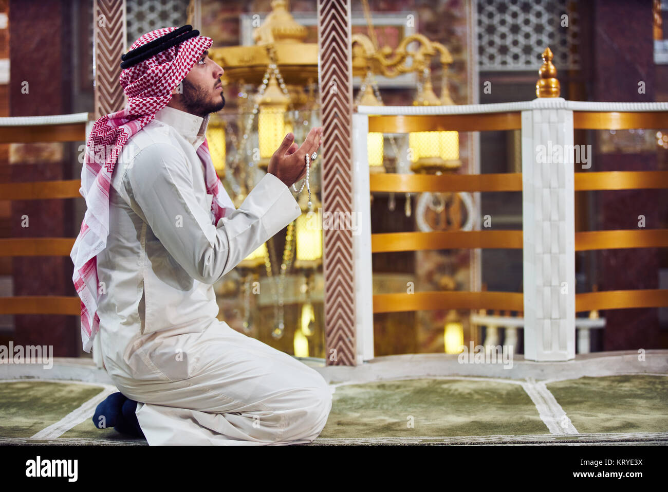 Religious muslim man praying inside the mosque Stock Photo - Alamy