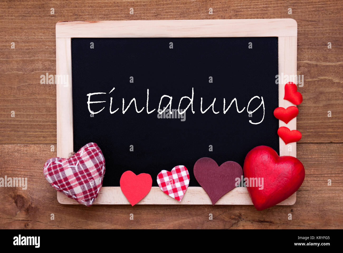 Chalkboard With German Text Einladung Means Invitation. Red Textile ...