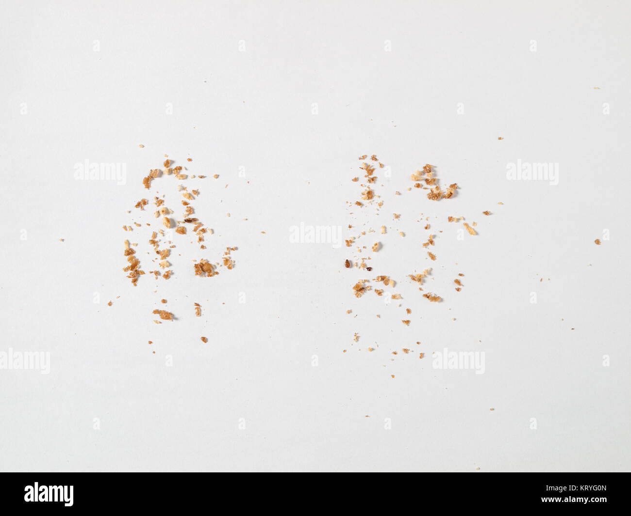 Scattered crumbs isolated on white background Stock Photo - Alamy