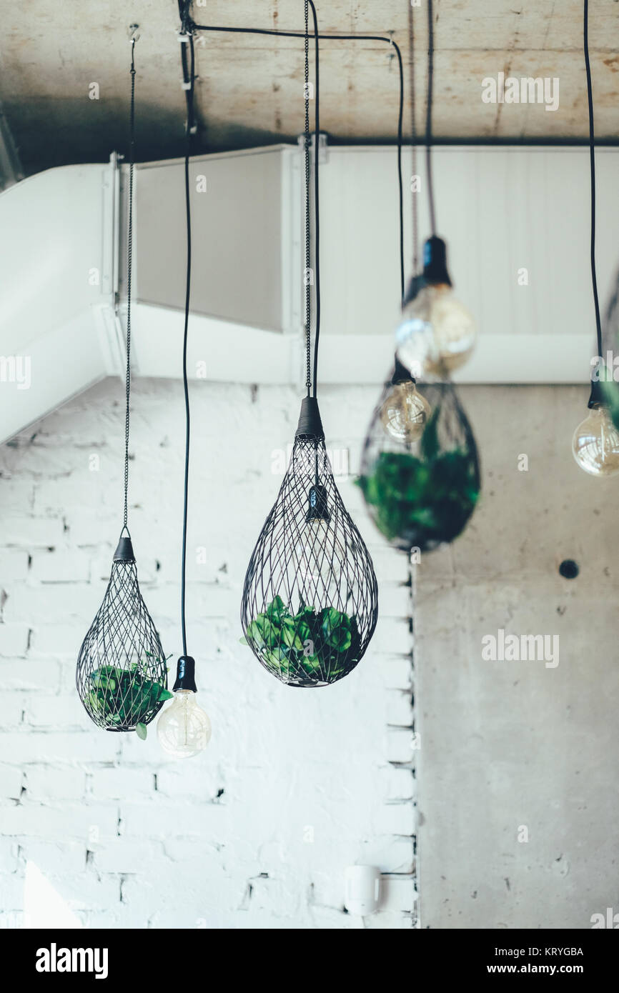 Hanging lamps green concept lighting Stock Photo - Alamy