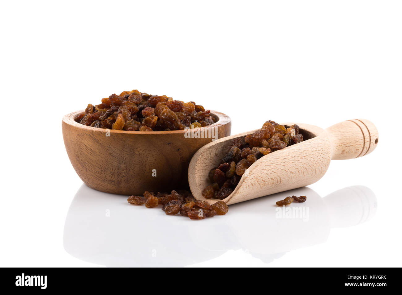 Sweet raisins on white Stock Photo - Alamy