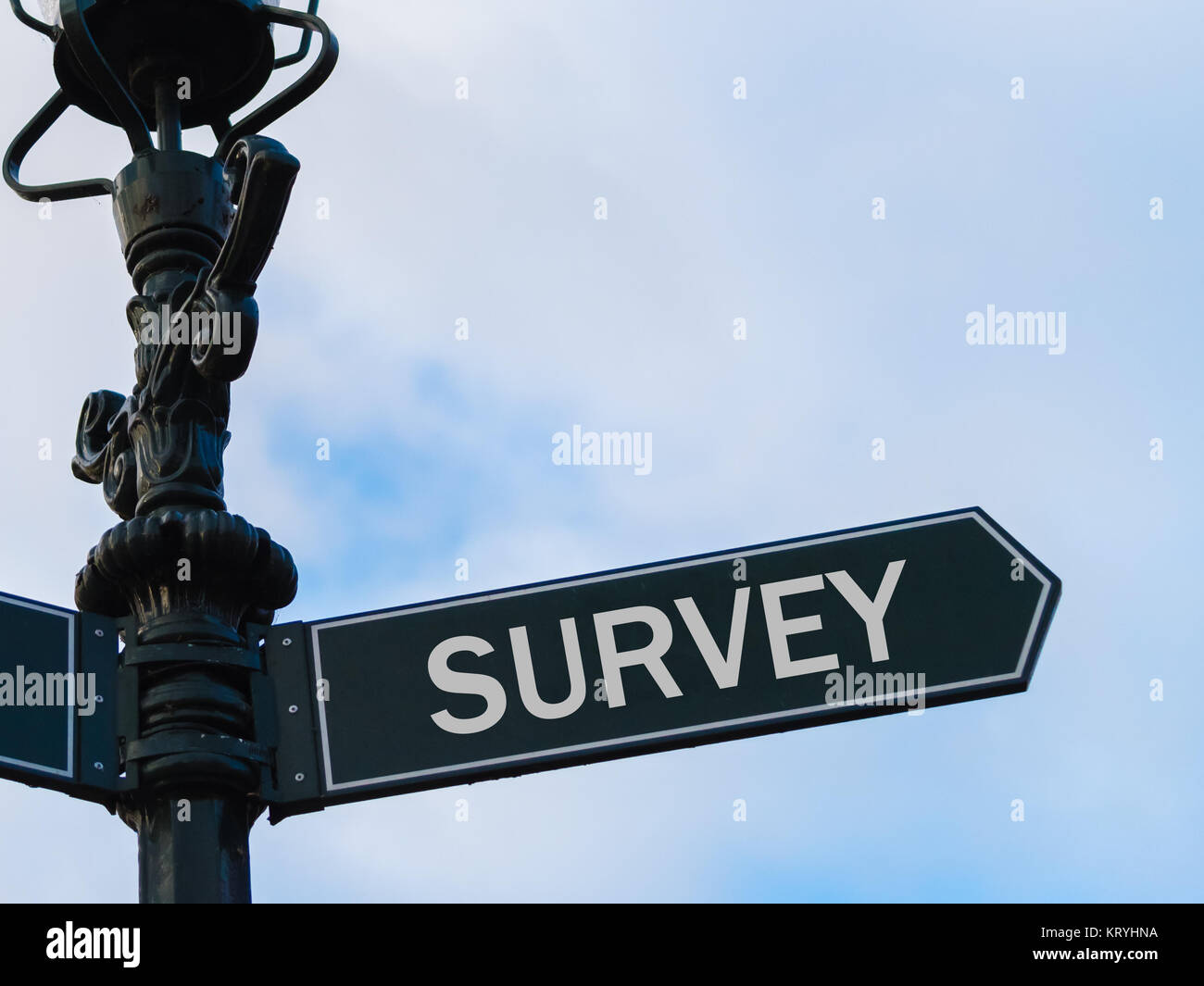 SURVEY directional sign on guidepost Stock Photo - Alamy