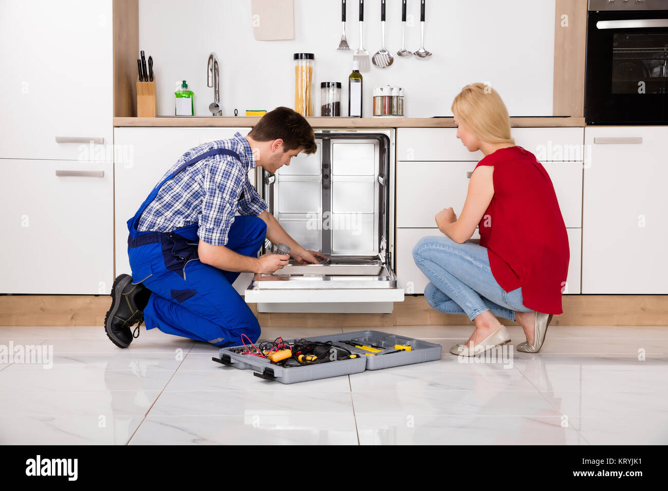 Appliance Repair Woman Stock Photos & Appliance Repair Woman Stock ...