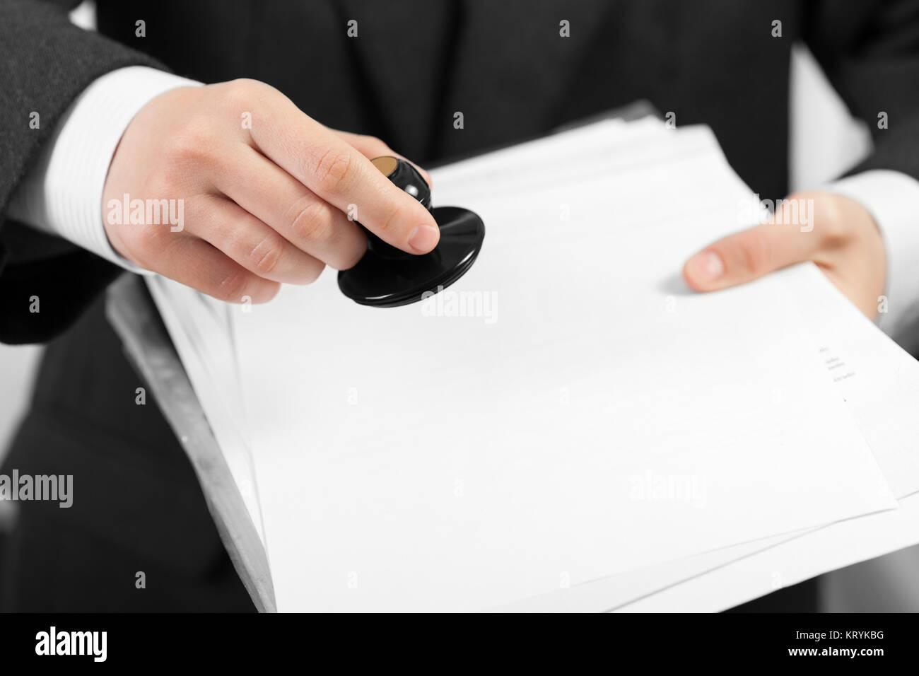 Business men hand hold office paper document stamp Stock Photo - Alamy