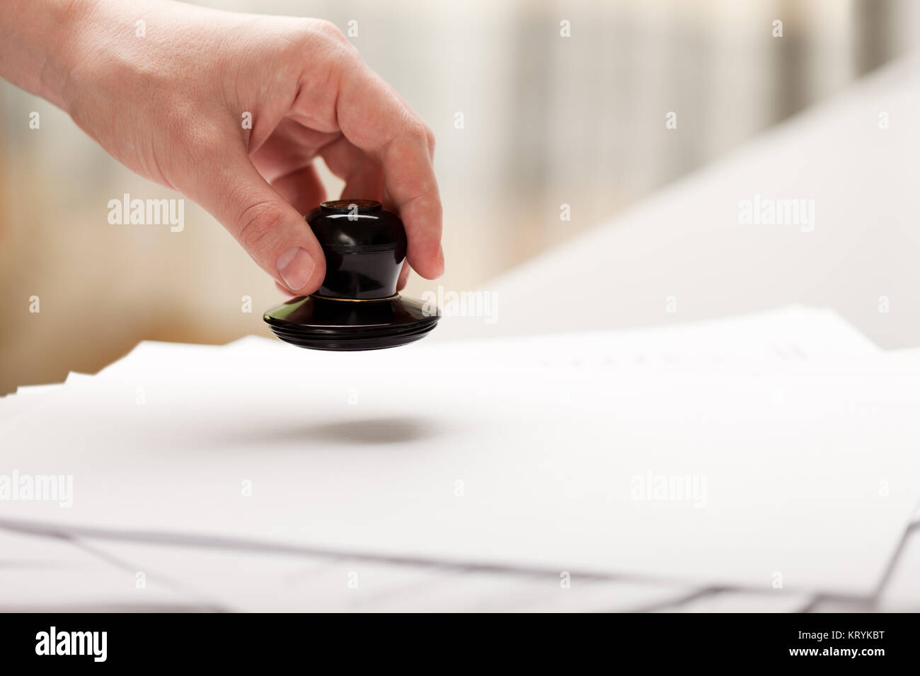 Office paper document stamp in business human hand Stock Photo - Alamy