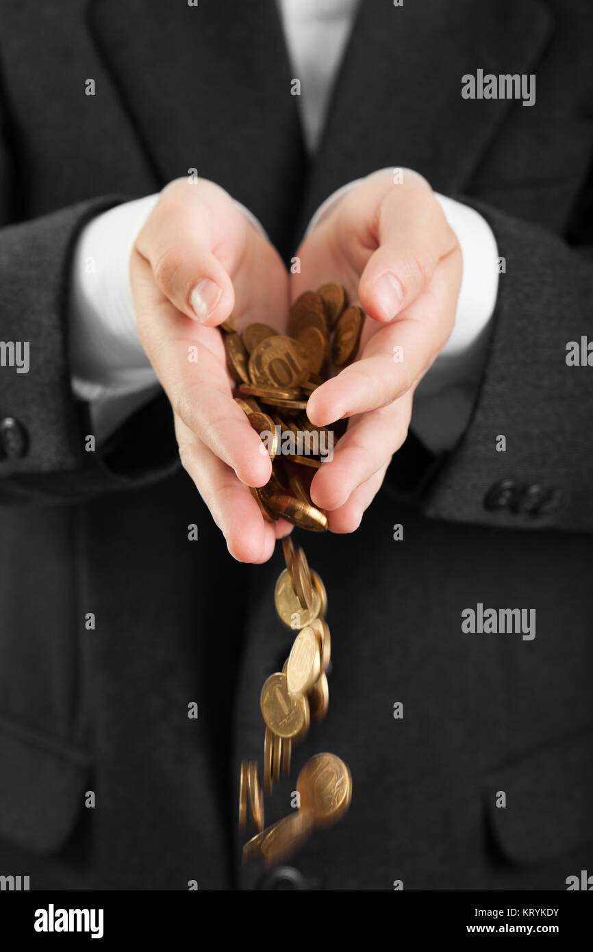 Business men hands holding finance currency coins Stock Photo - Alamy