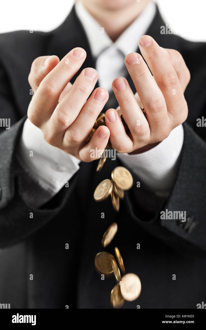 Business man hands holding finance currency coins Stock Photo - Alamy