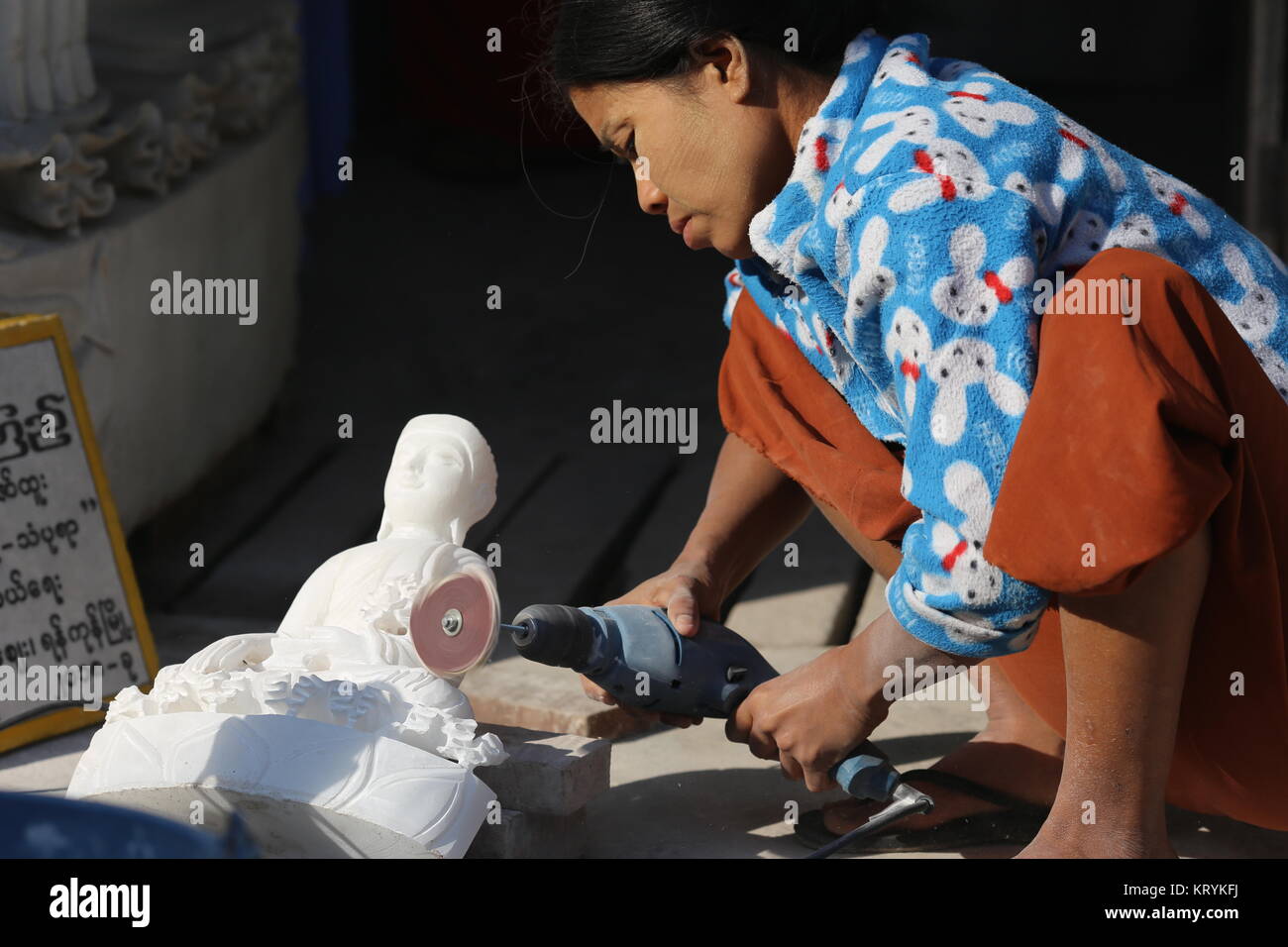 Scenes of the stone-masons busily cutting and polishing marble in the ...