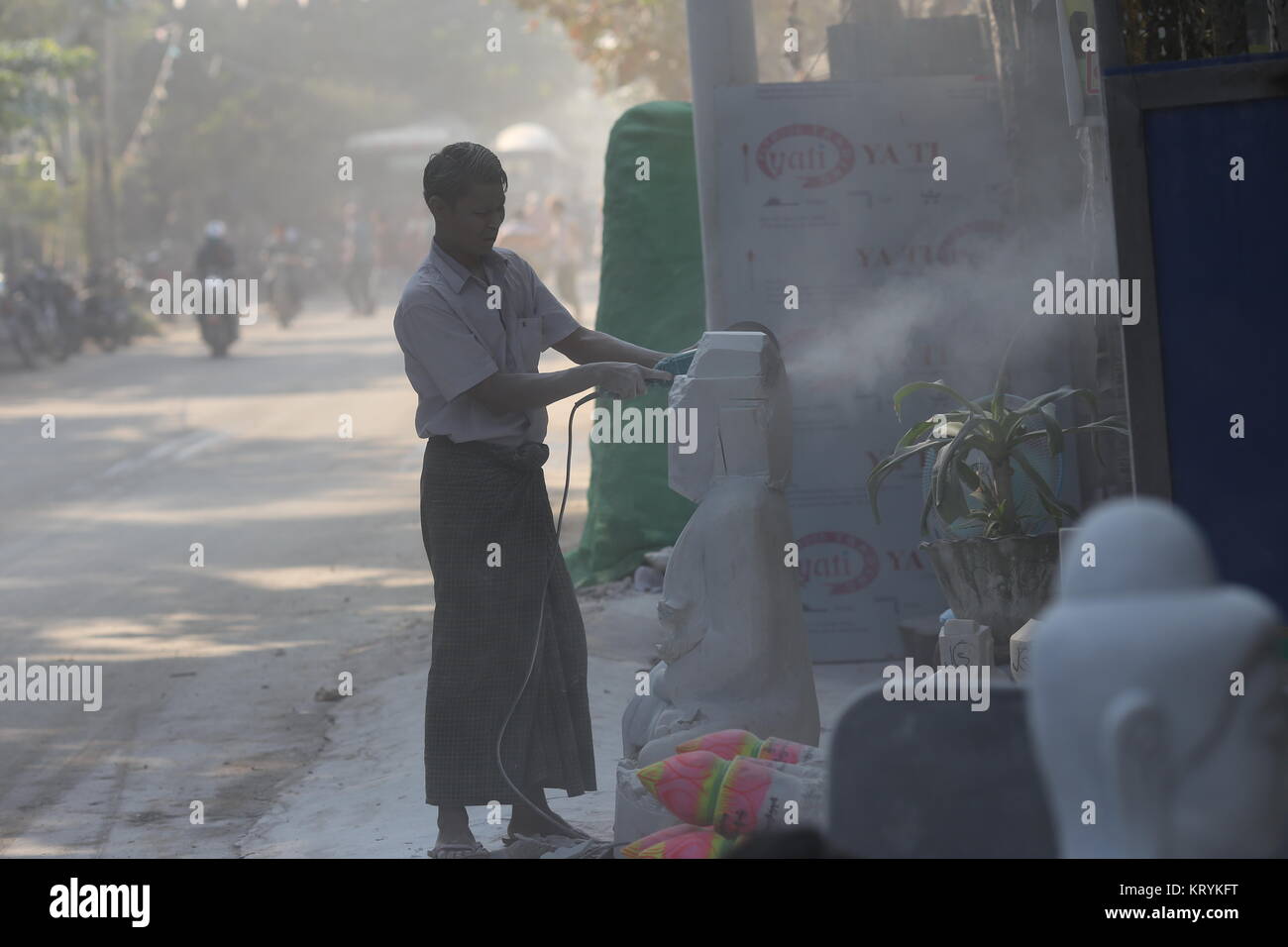 Scenes of the stone-masons busily cutting and polishing marble in the ...