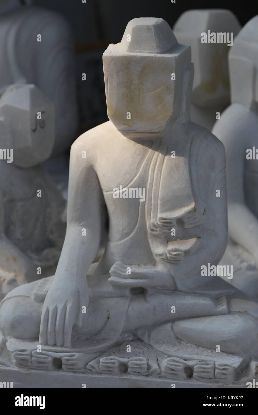 Scenes of the stone-masons busily cutting and polishing marble in the ...
