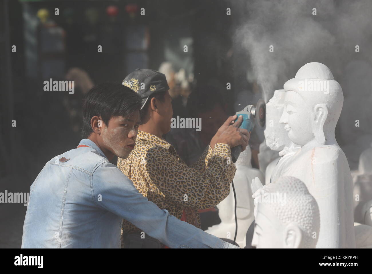 Scenes of the stone-masons busily cutting and polishing marble in the ...