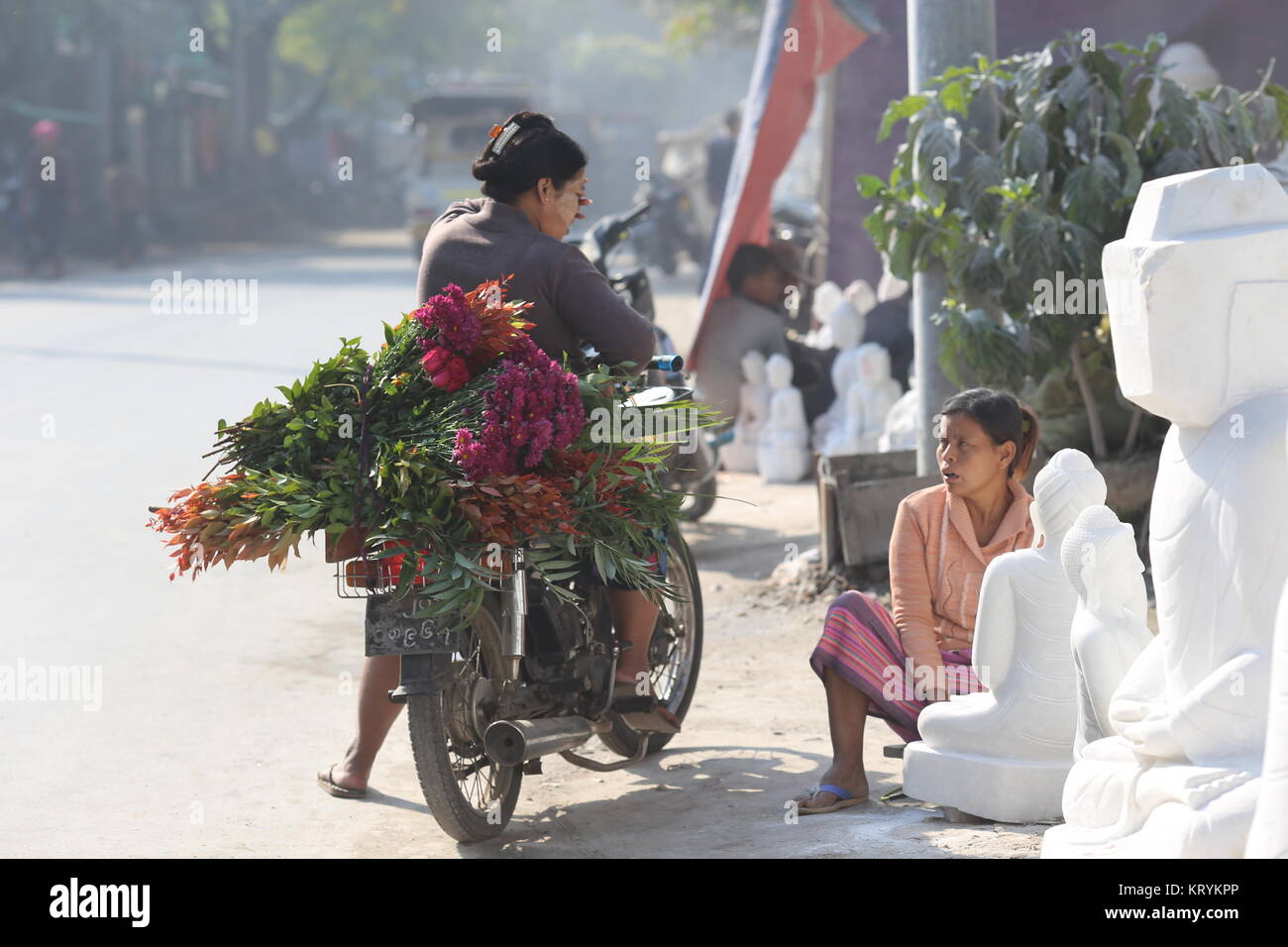 Scenes of the stone-masons busily cutting and polishing marble in the ...