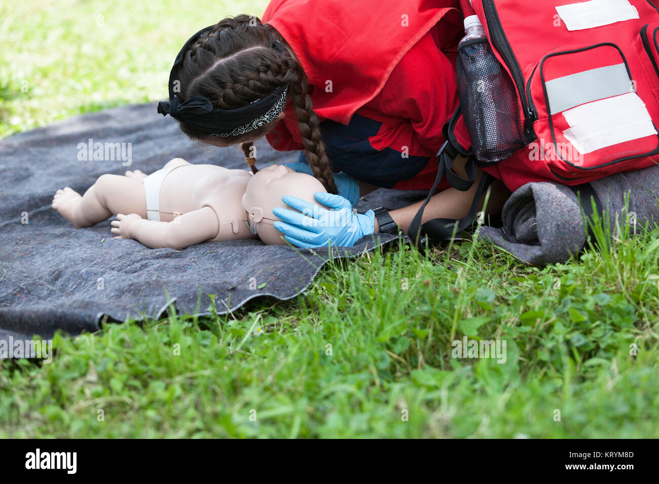 Paramedic demonstrate Cardiopulmonary resuscitation (CPR) on baby dummy ...