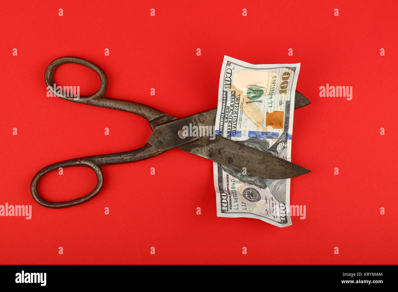 Us money scissors hi-res stock photography and images - Alamy