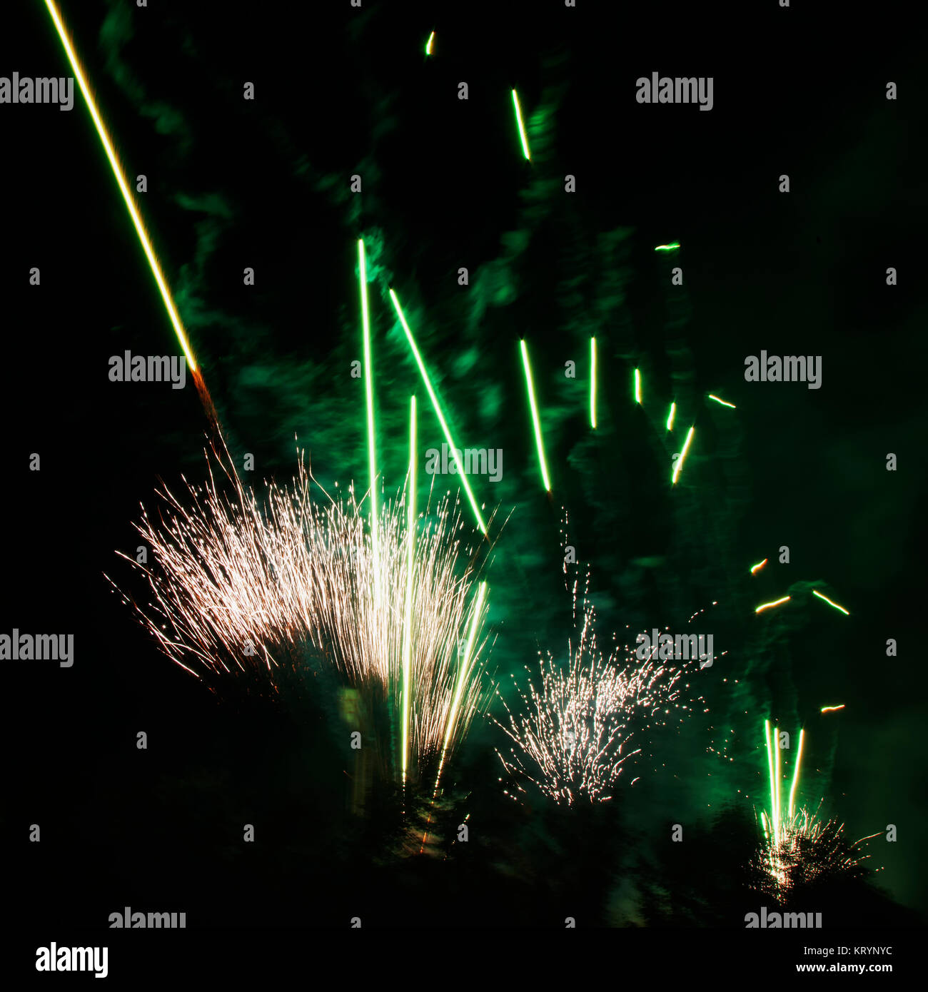 Green fireworks over black sky Stock Photo - Alamy