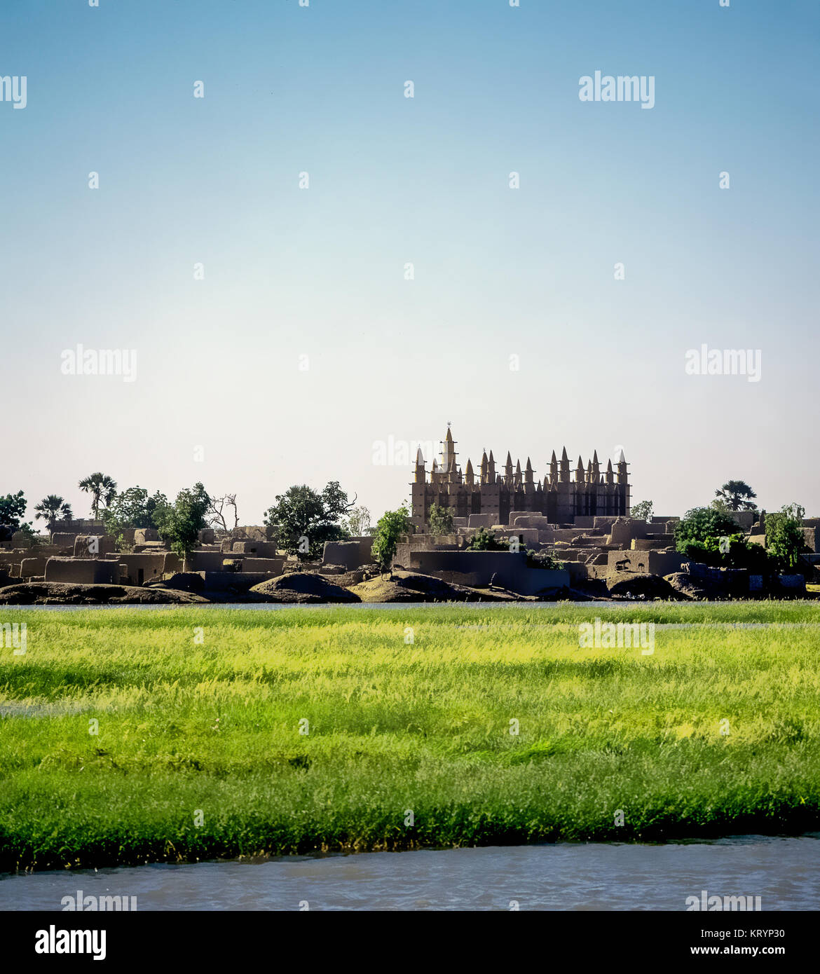 View of Saba village and beautiful adobe mosque by the Niger river ...