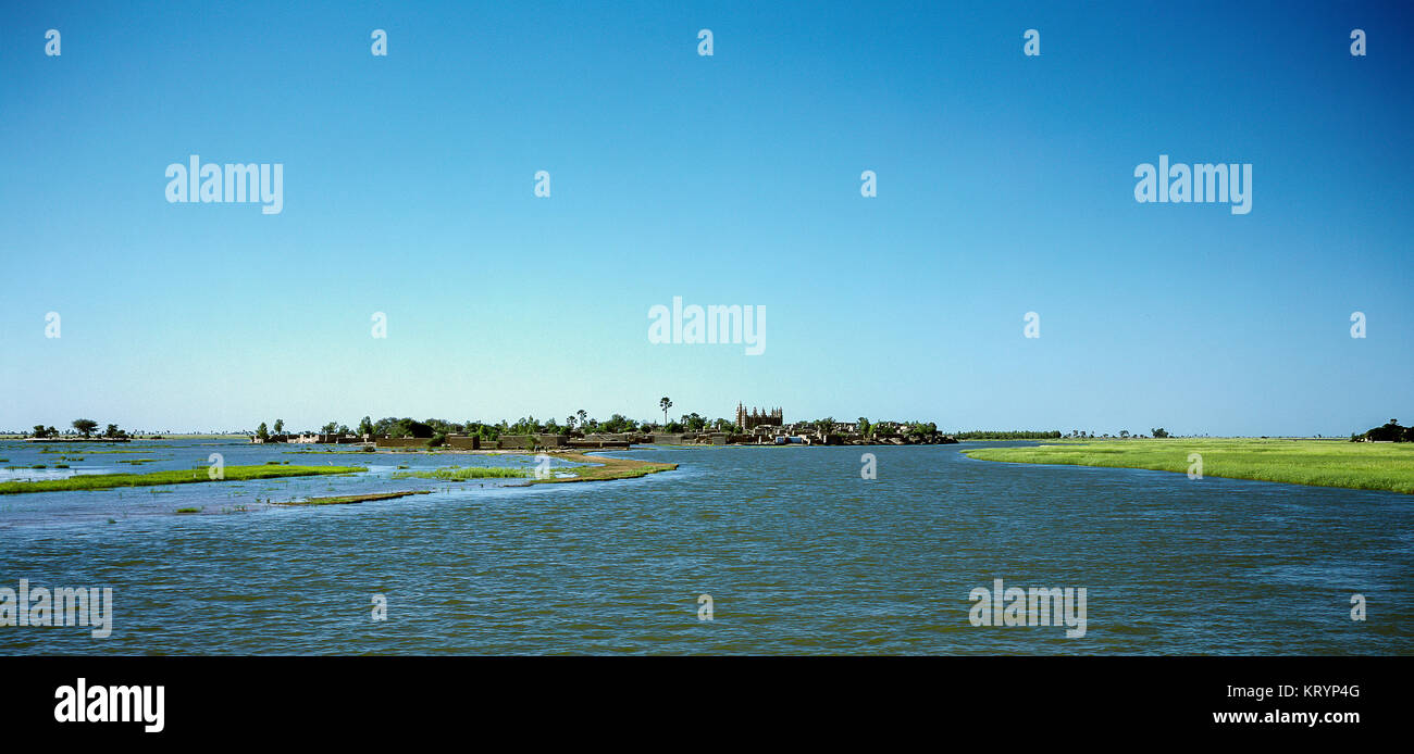 View of Saba village and beautiful adobe mosque by the Niger river ...