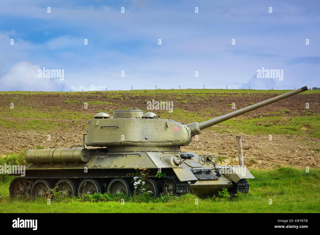 Tank on the Field Stock Photo - Alamy