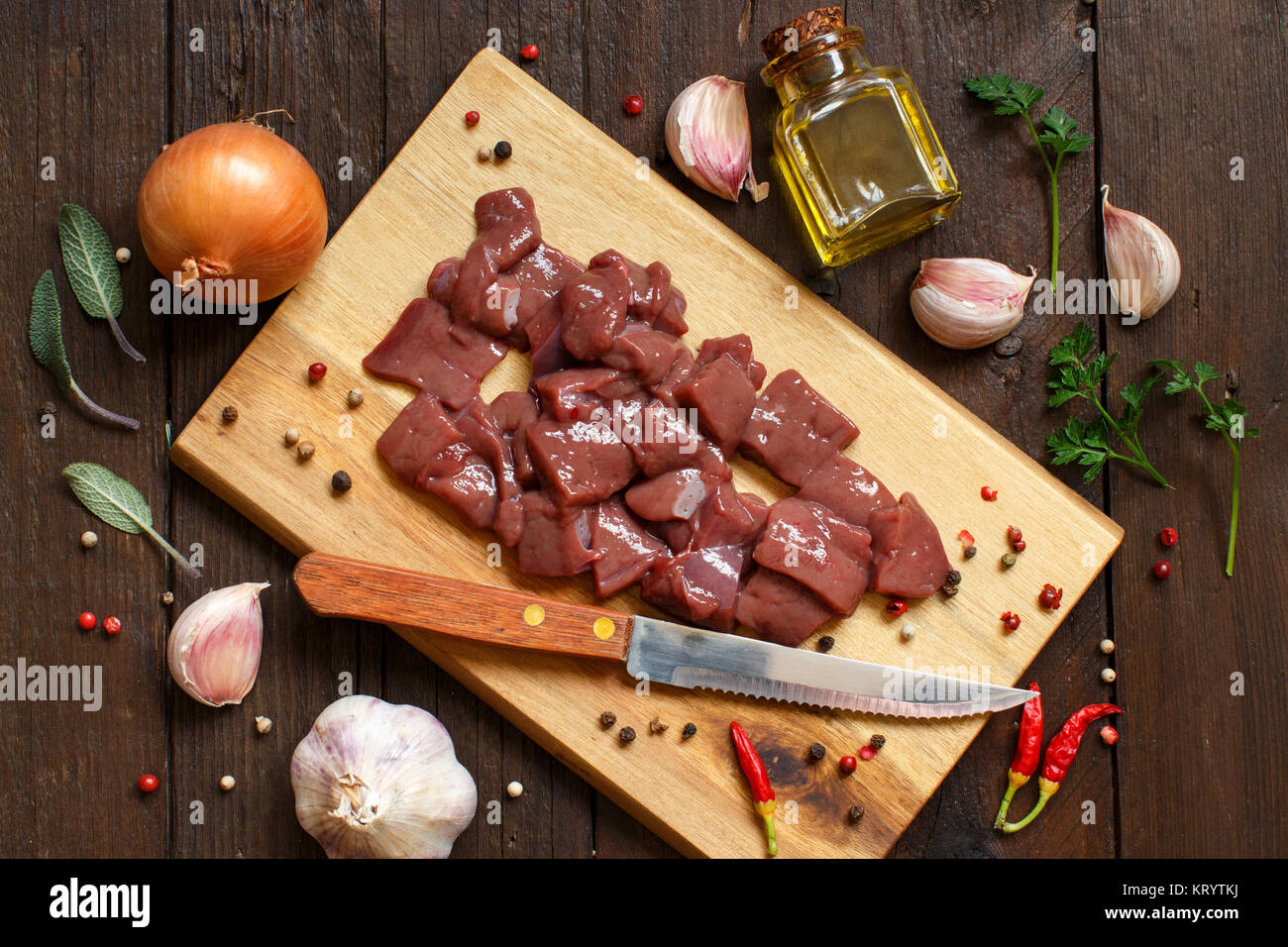Raw beef liver with spices, herbs and vegetables Stock Photo - Alamy