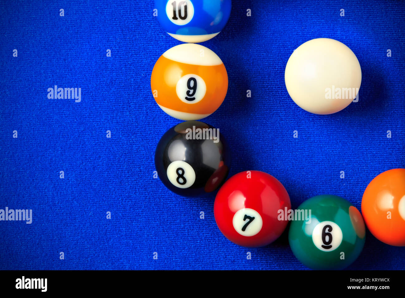 Billiard balls in a blue pool table Stock Photo - Alamy