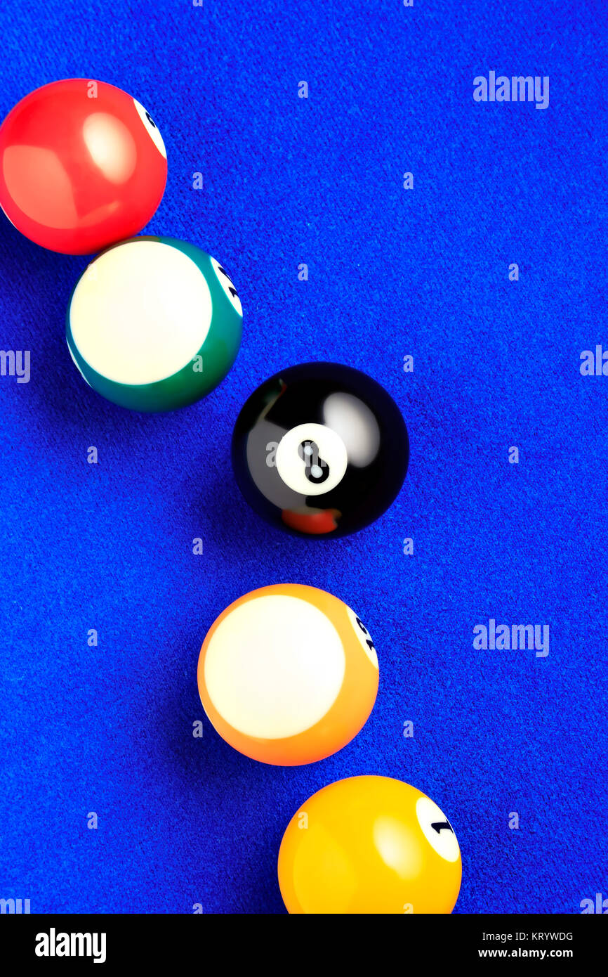 Billiard balls in a blue pool table Stock Photo - Alamy