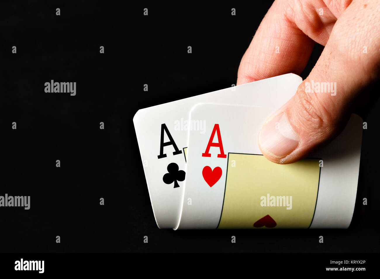 Hand holding two aces Stock Photo - Alamy