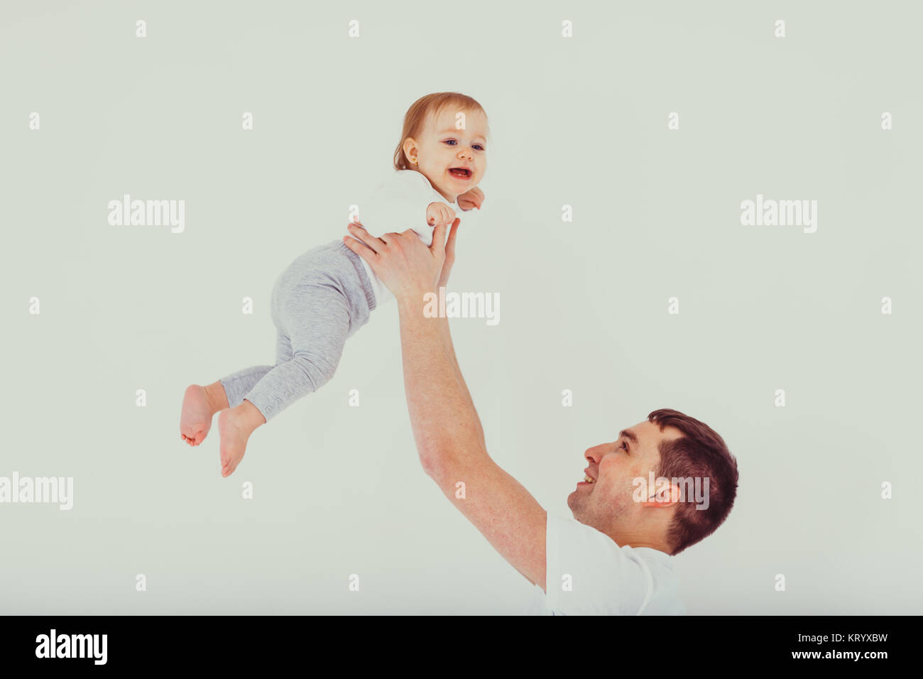 Dad and baby having fun Stock Photo - Alamy