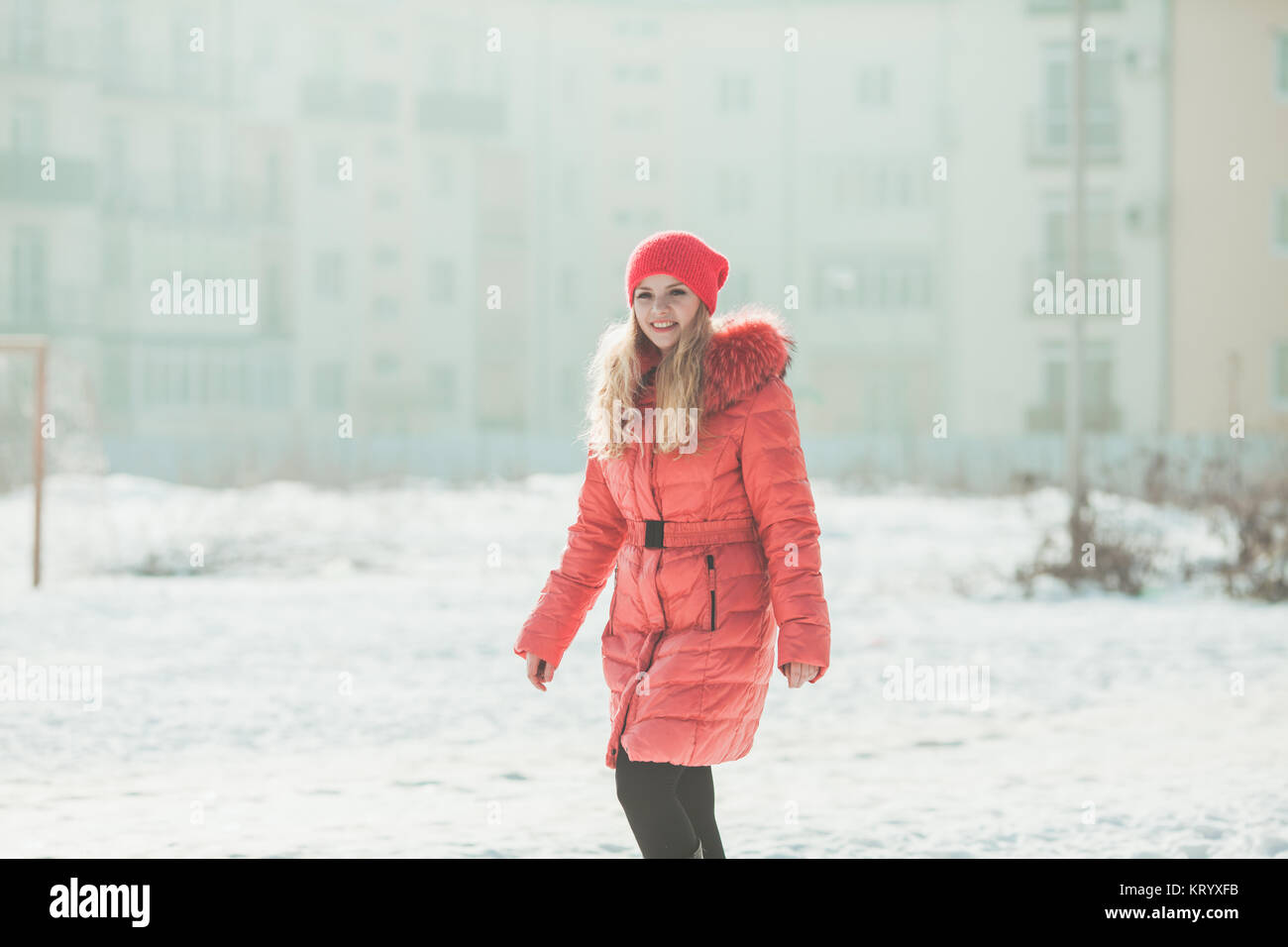 Girl in red parka Stock Photo - Alamy