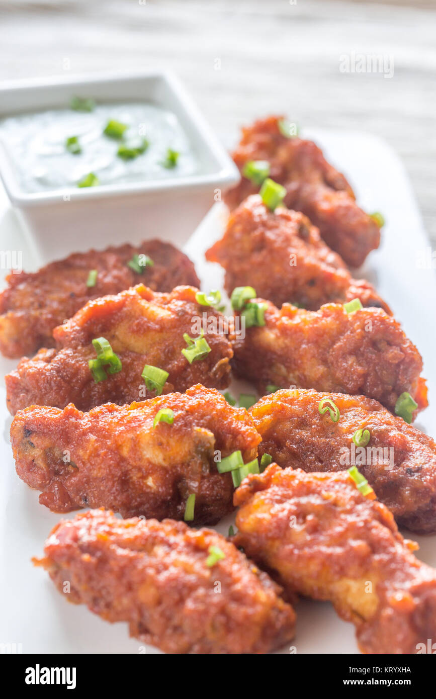 Fried chicken wings with blue cheese sauce Stock Photo - Alamy