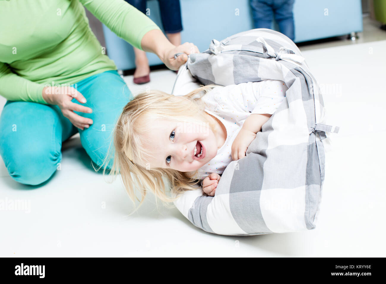 Mother is rocking her baby Stock Photo - Alamy