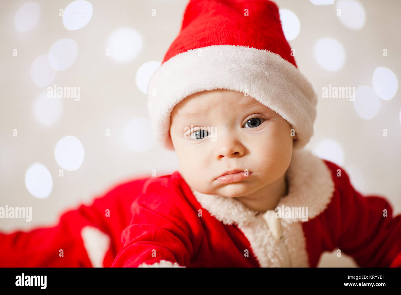 Little Santa baby Stock Photo - Alamy