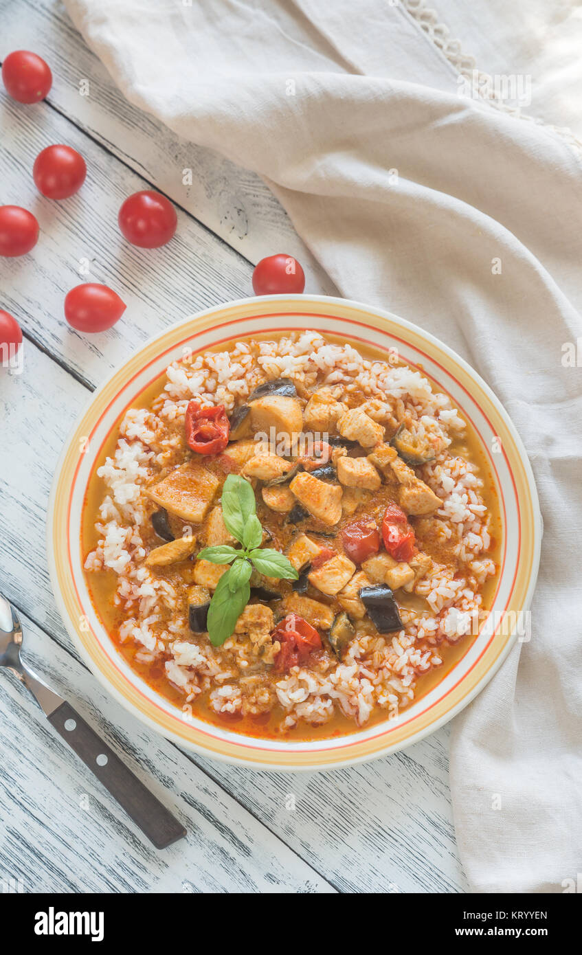 Thai red chicken curry with white rice Stock Photo - Alamy